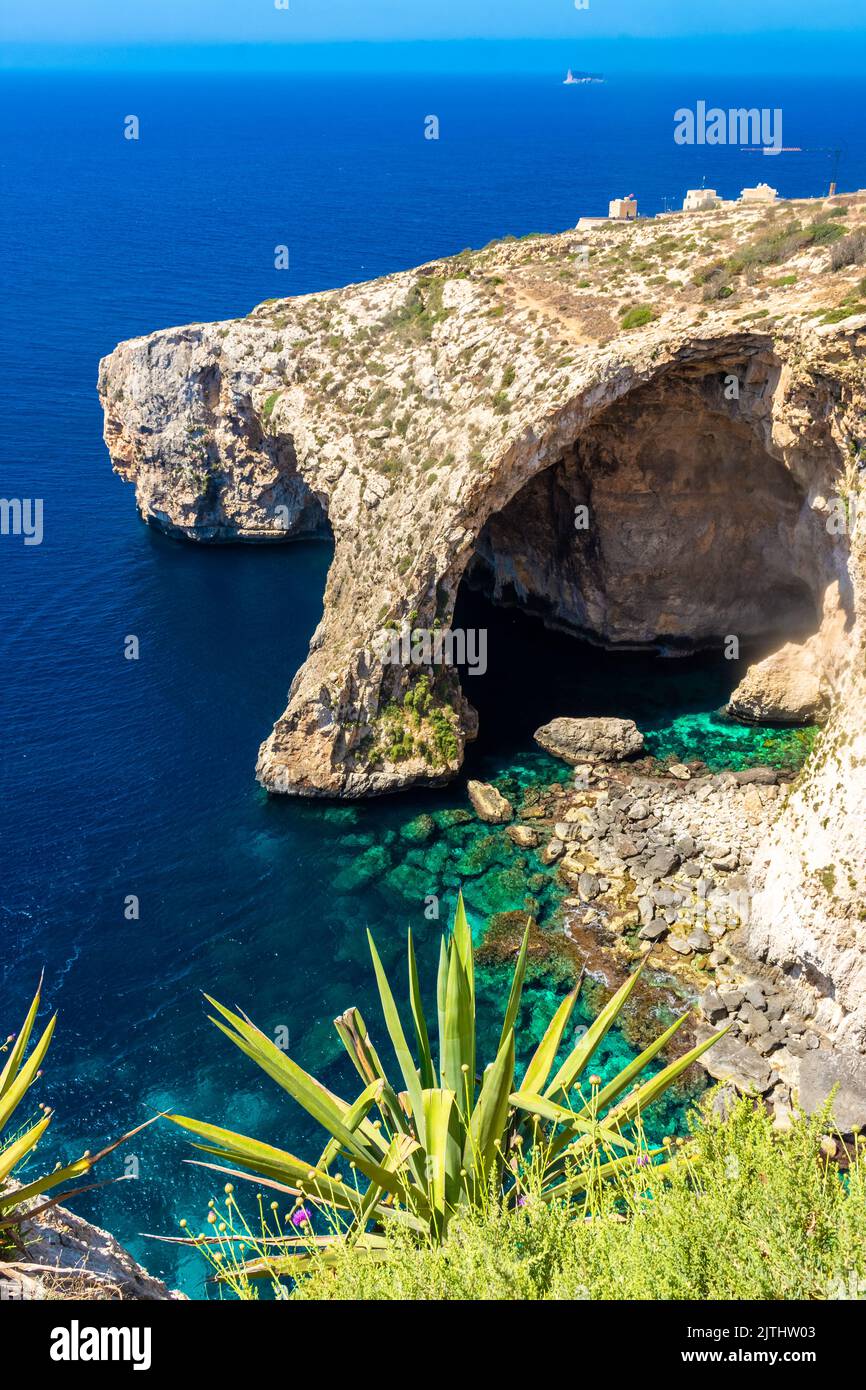 The Blue Grotto of Malta, rock formation on the sea with crystal clear ...
