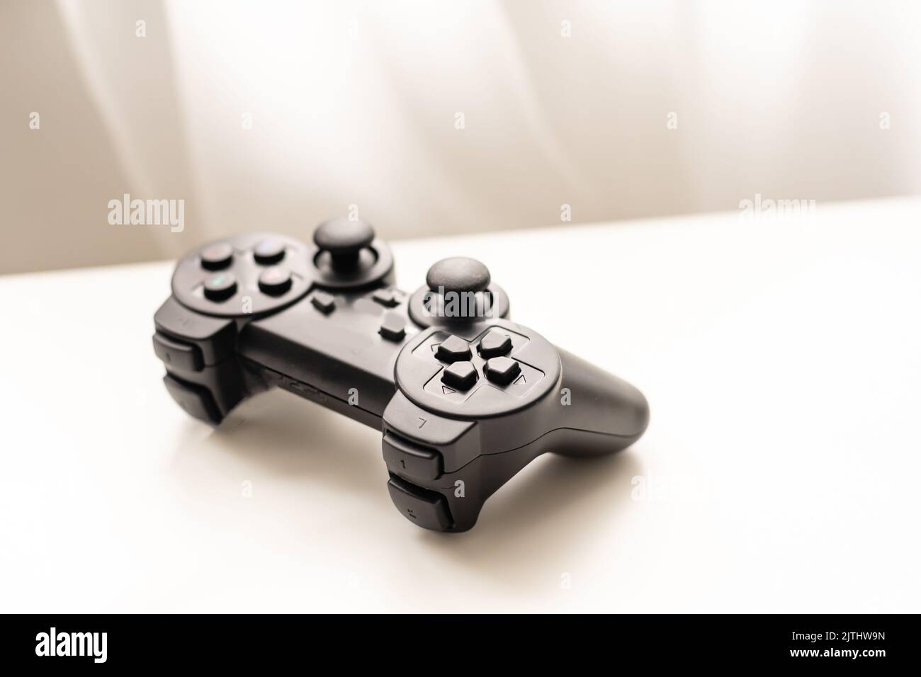 Black joystick isolated on a white background Stock Photo - Alamy