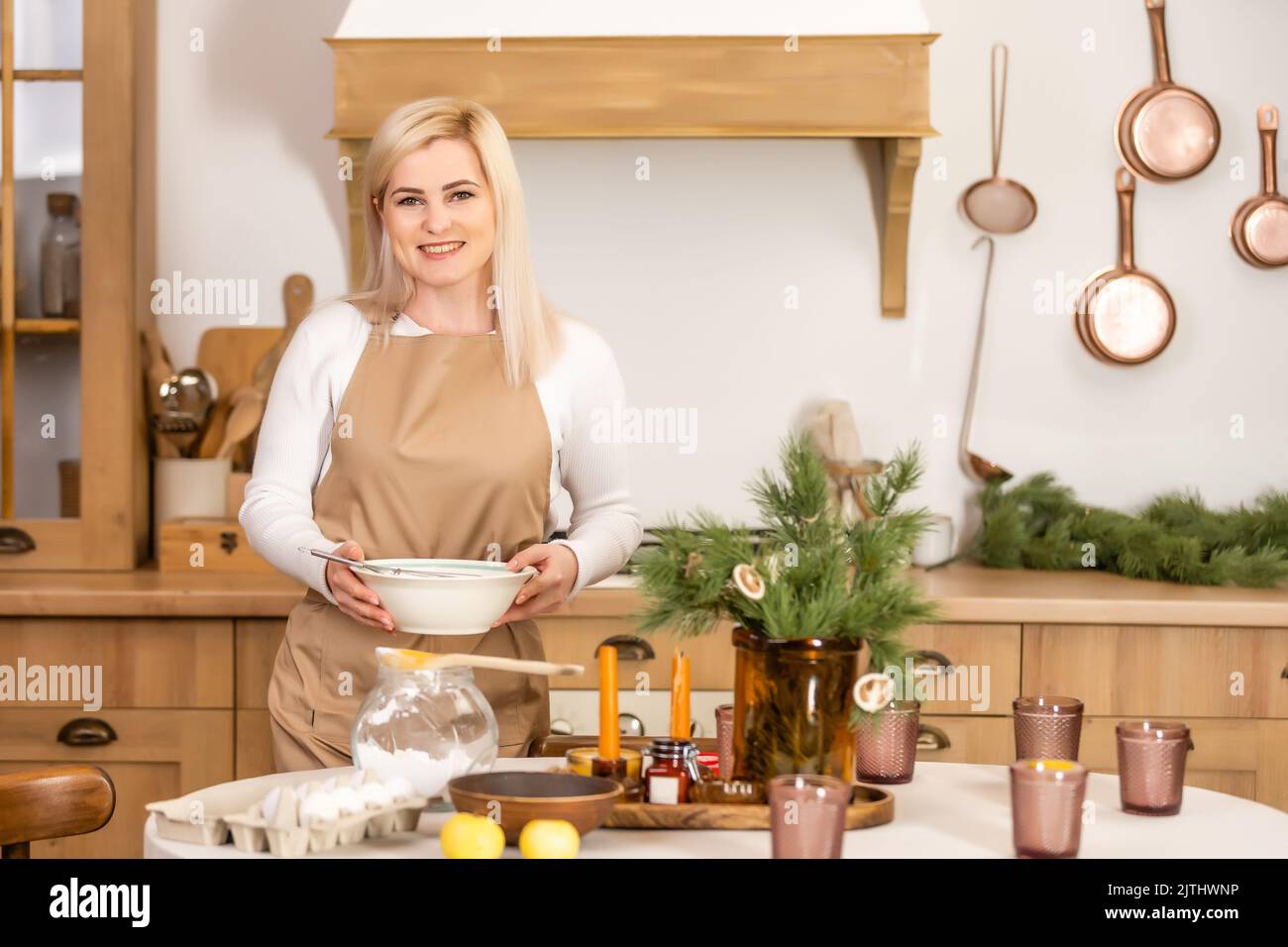 Christmas bakery. Woman cooking before christmas. Festive food, cooking ...