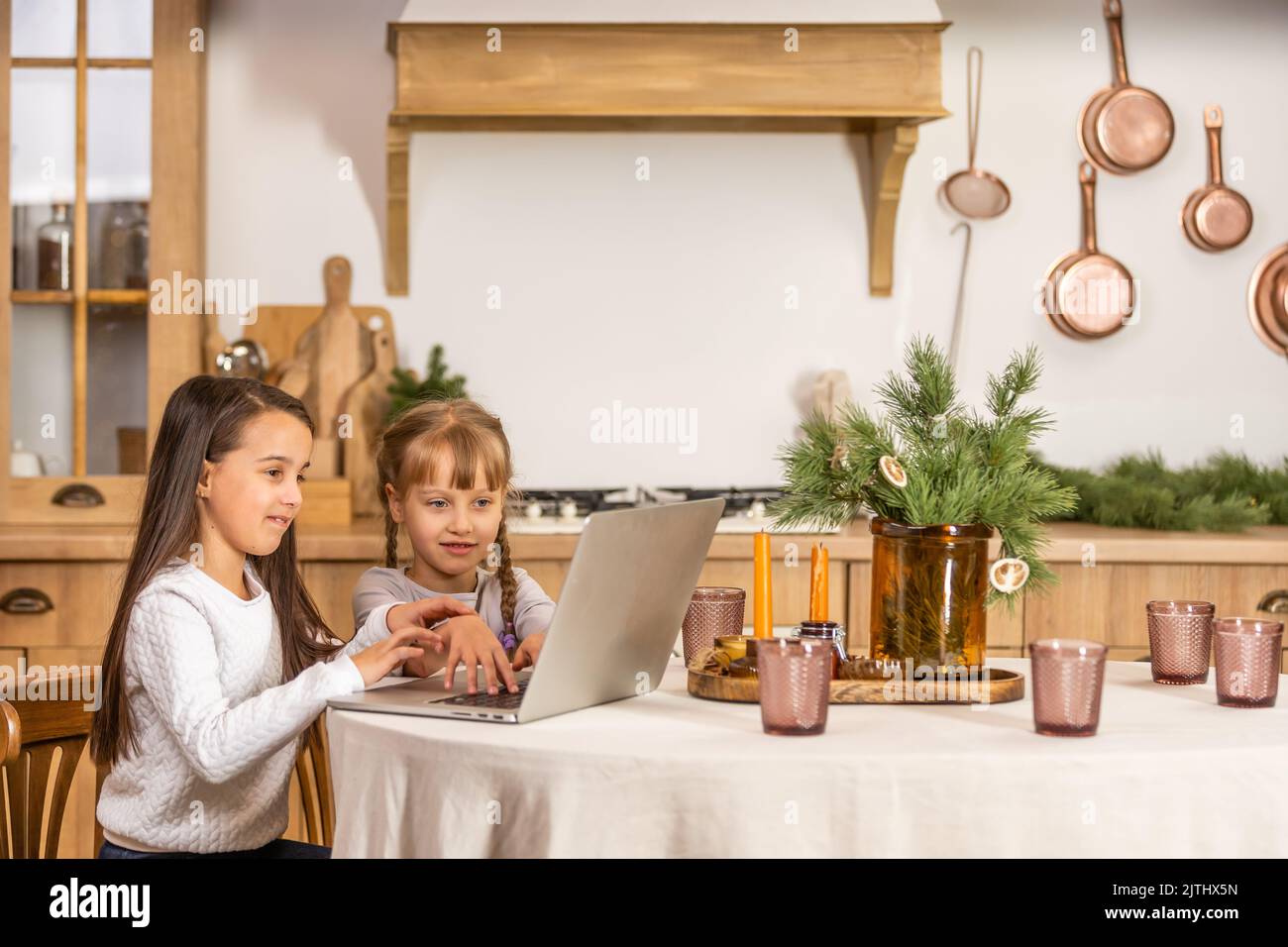 two little girls studying online. Distance Learning Online, e-learning ...