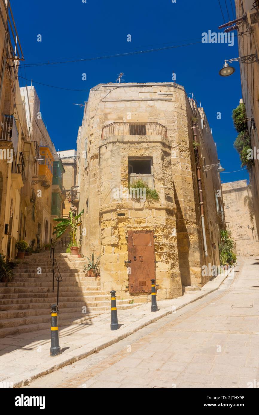 View of an ancient street in Birgu old town, one of the Three Cities of ...