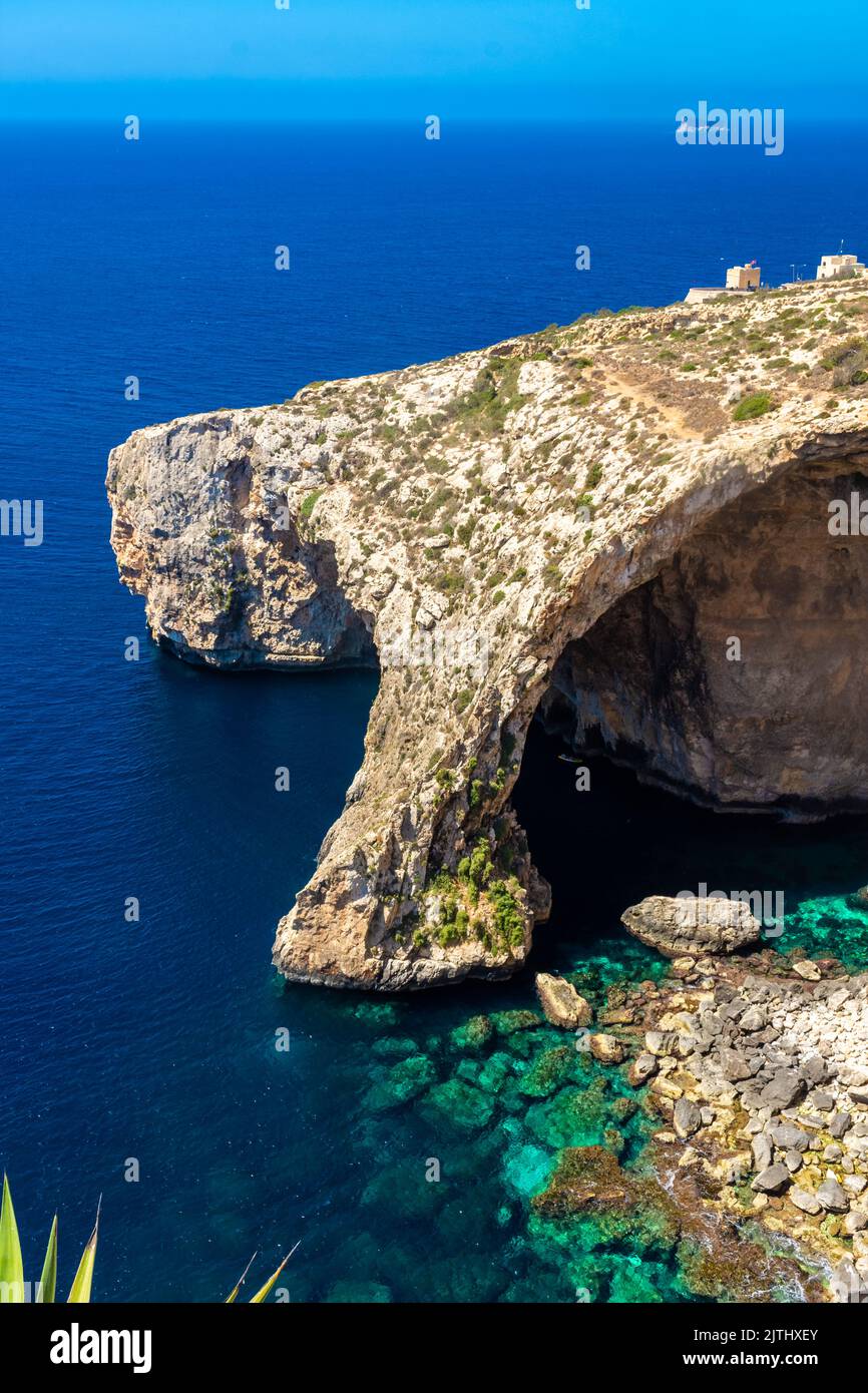 The Blue Grotto of Malta, rock formation on the sea with crystal clear ...