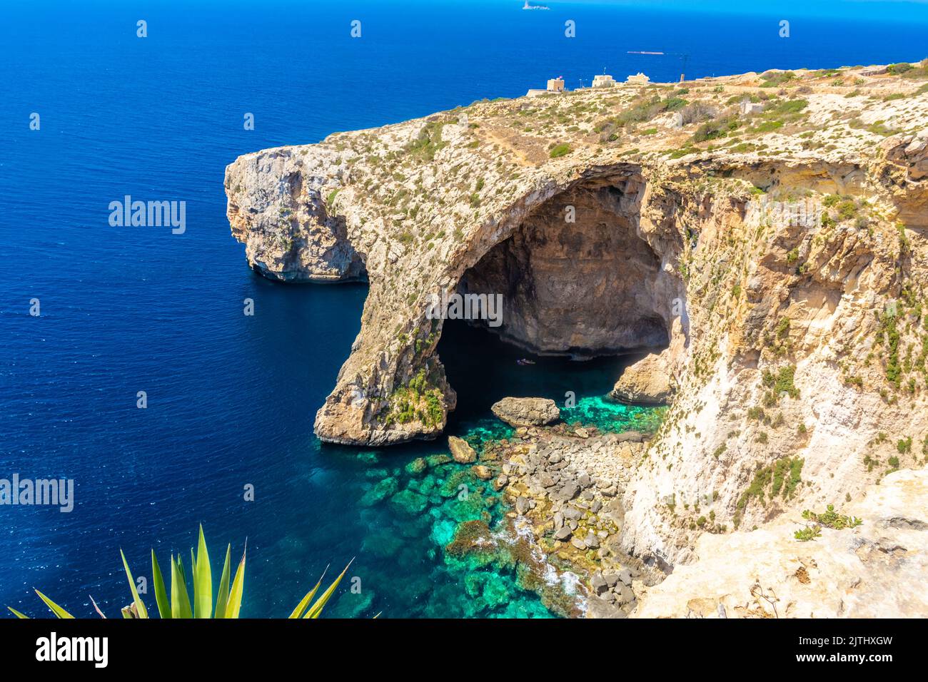 The Blue Grotto of Malta, rock formation on the sea with crystal clear ...