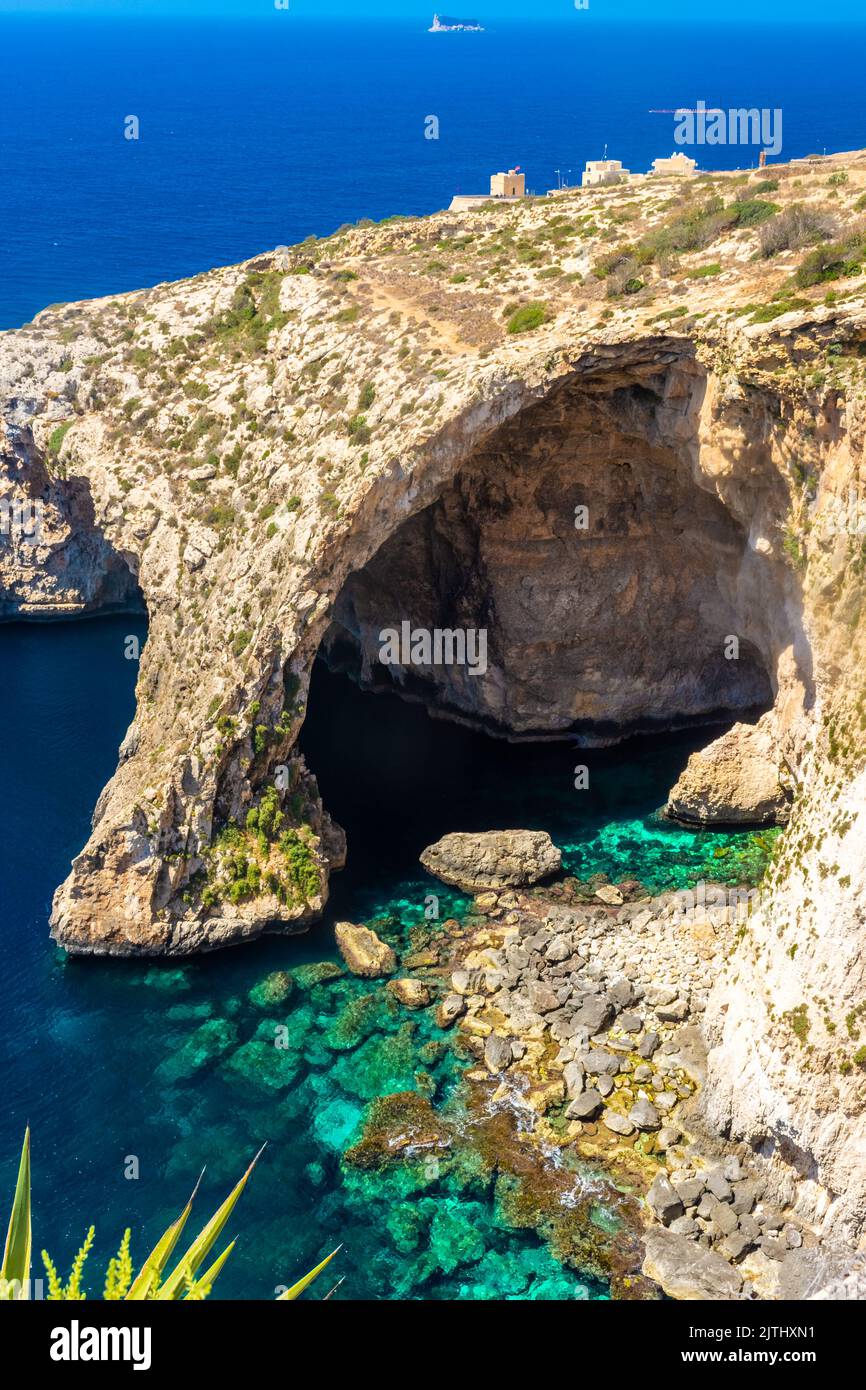 The Blue Grotto of Malta, rock formation on the sea with crystal clear ...