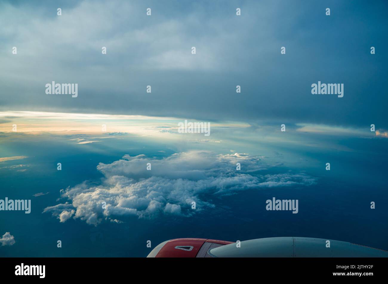 Panoramic aerial view. Beautiful sunset sky above clouds with dramatic ...