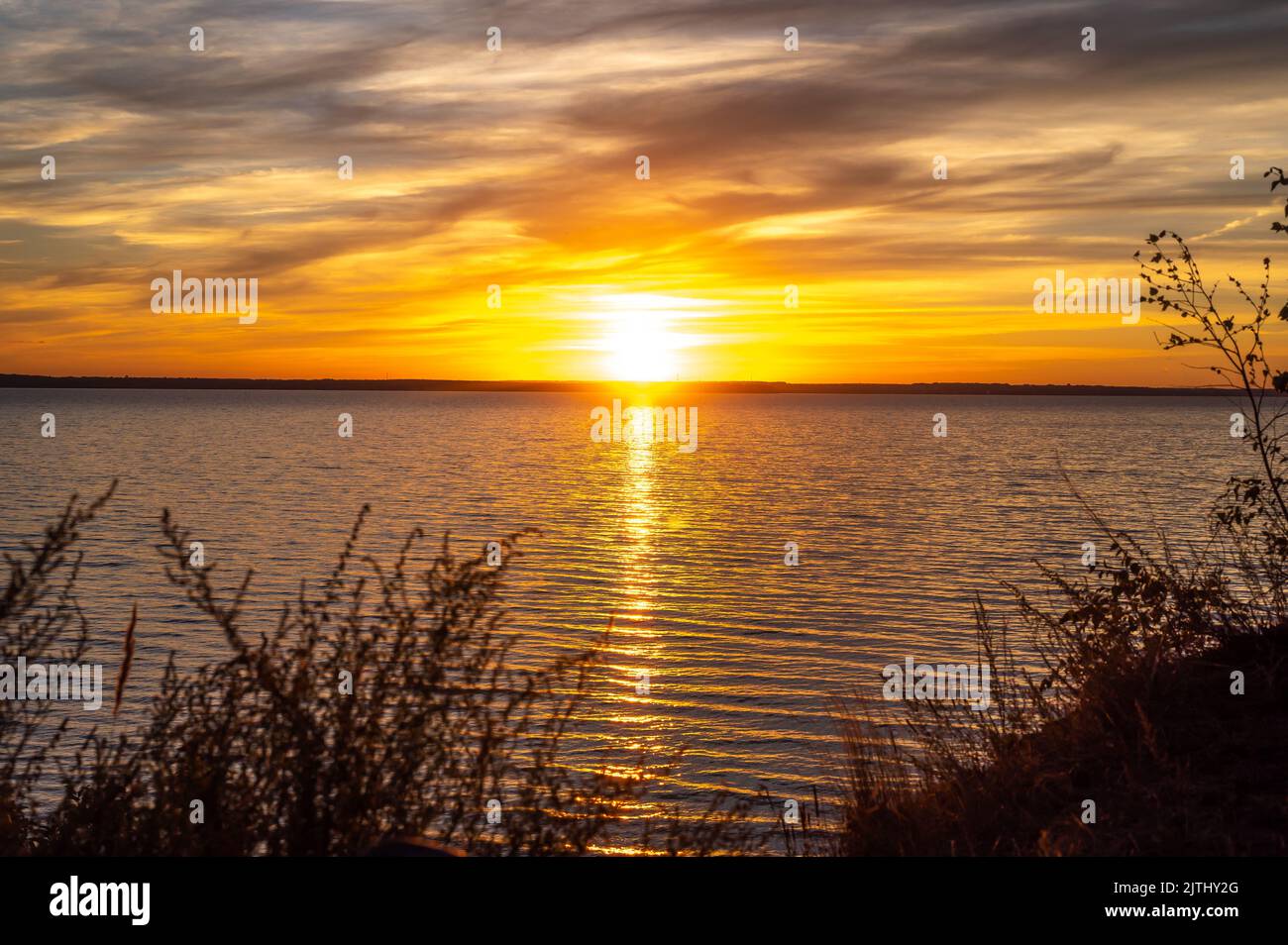 Fiery orange sunset sky. Natural Sunset Sunrise Over Field Or Meadow ...