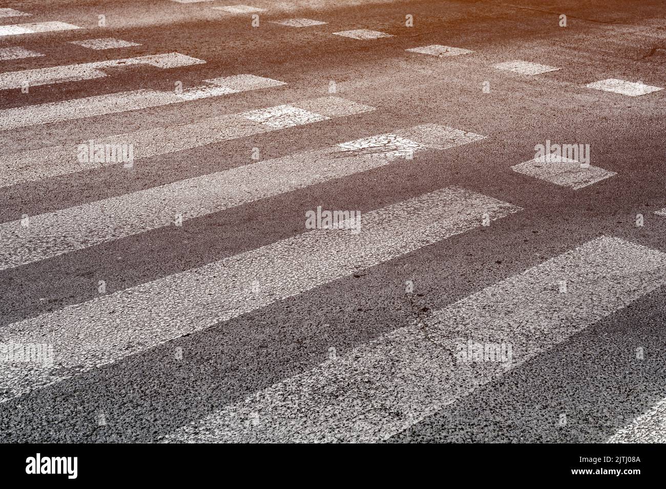 Pedestrian zebra crossing on asphalt road as abstract background Stock ...