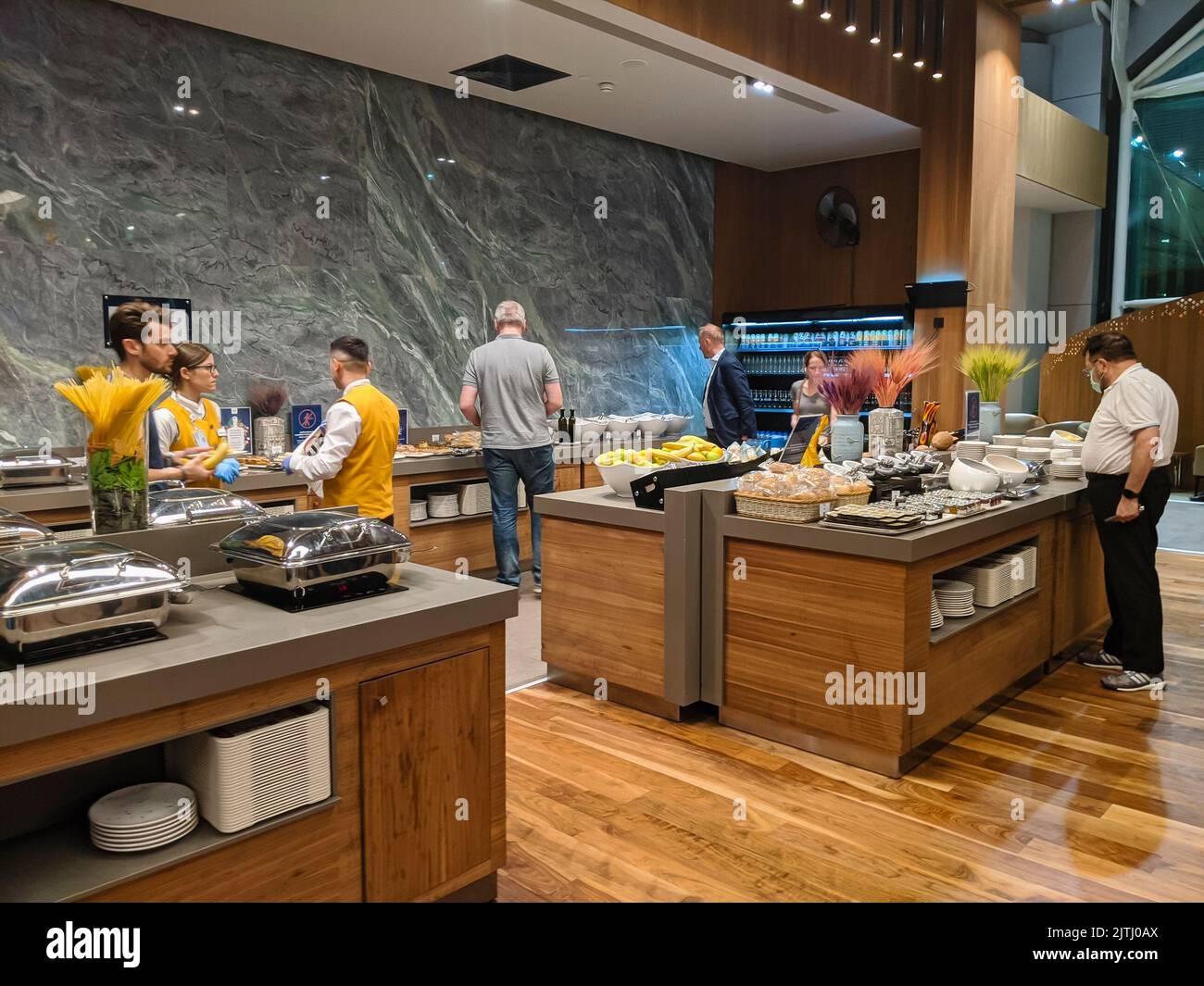 Buffet area in the business lounge of Istanbul Airport Stock Photo - Alamy
