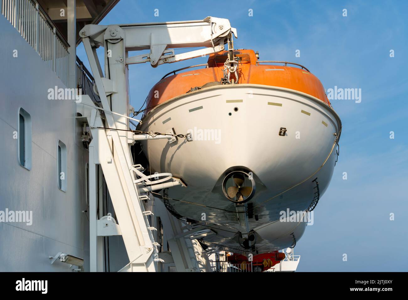 Image of Orange lifeboats on a cruise liner Stock Photo - Alamy