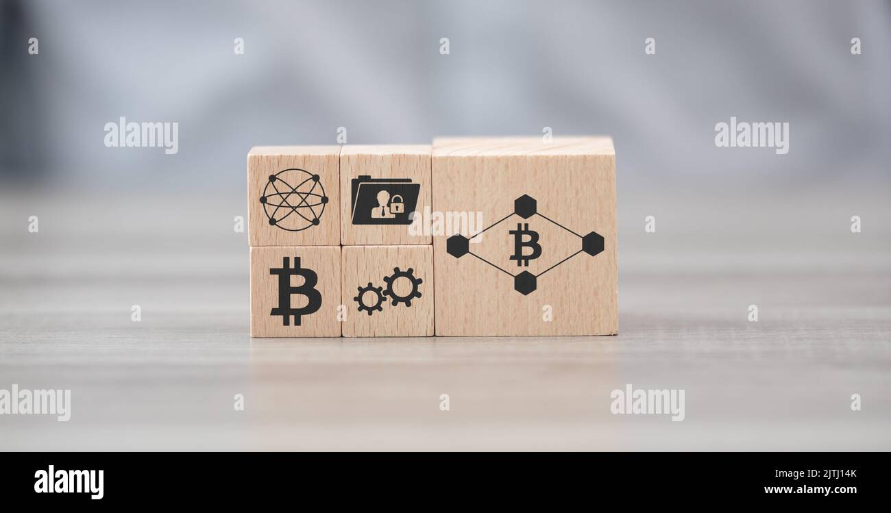 Wooden blocks with symbol of blockchain technology concept Stock Photo ...