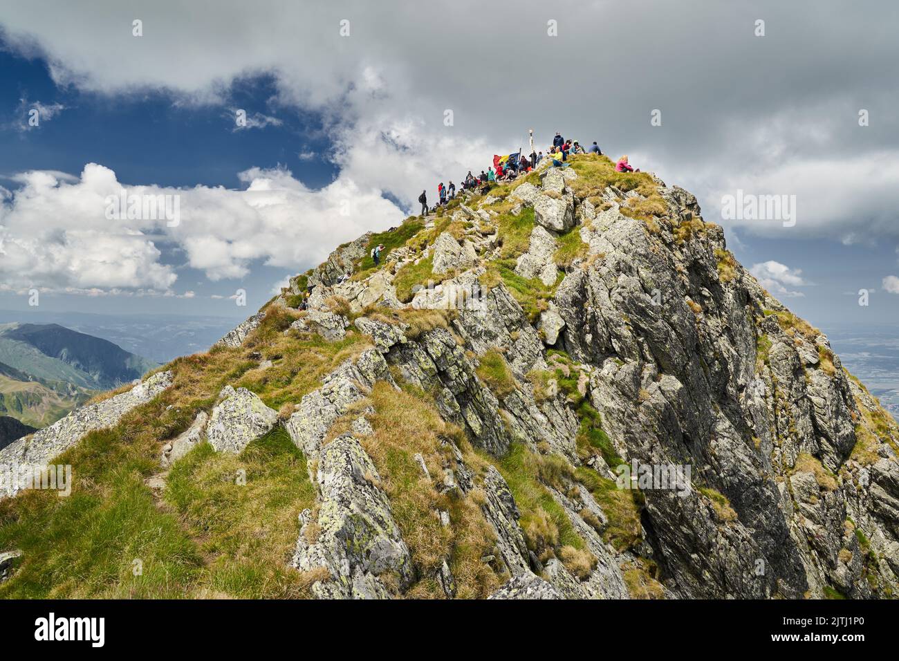 06th August 2022, Negoiu Peak, Romania - people climbing on top of the ...