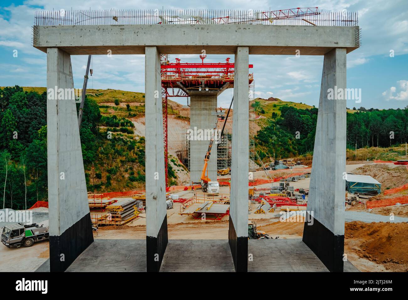 Constructing concrete pillars of the bridge. Construction of the new ...