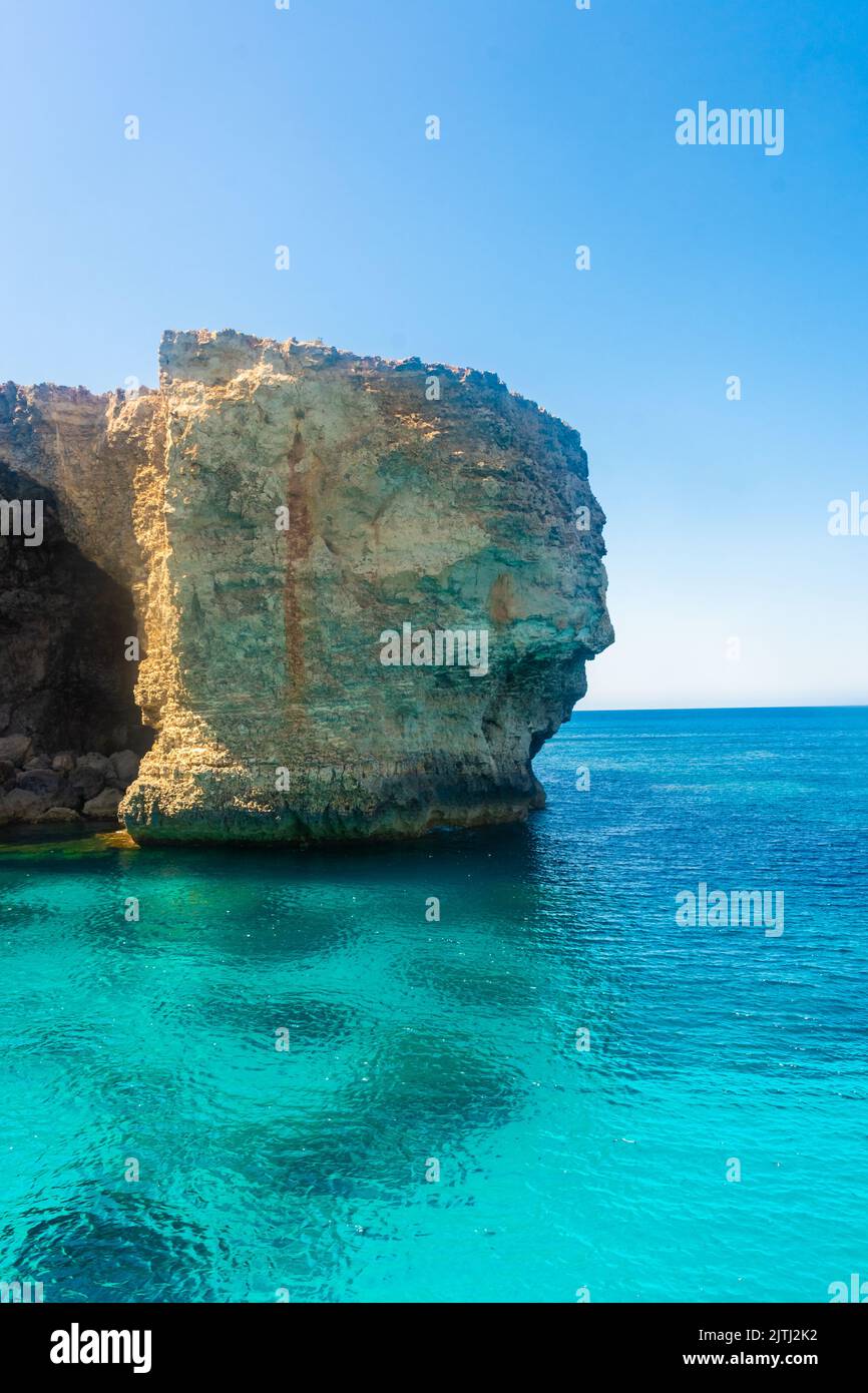 Crystal clear water under the cliffs of Malta Stock Photo - Alamy