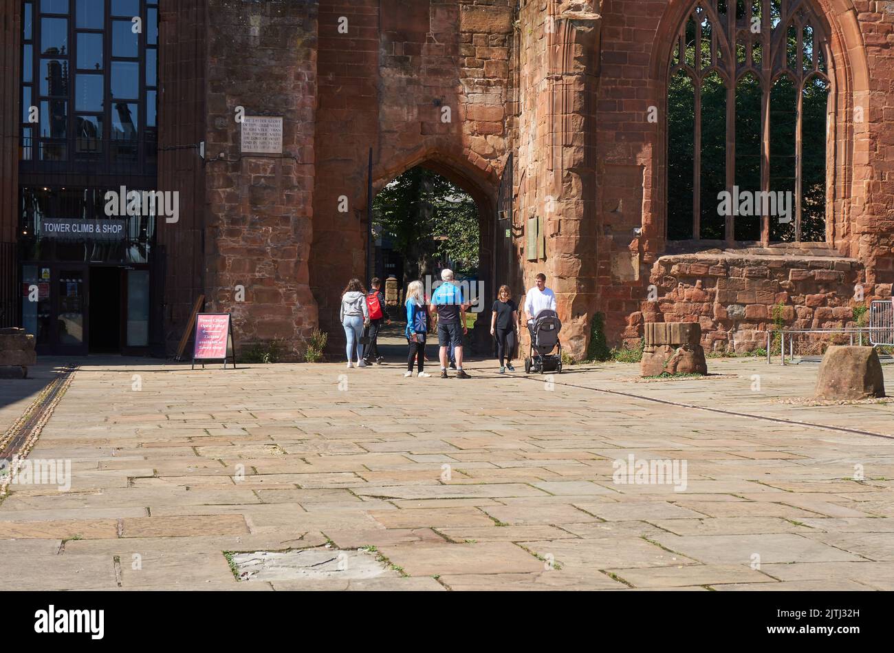 Tour guides at Coventry Cathedral, UK Stock Photo - Alamy