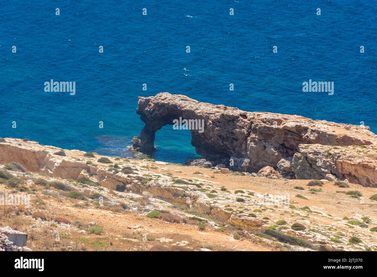 Rock arch over the sea at Dingli Cliffs, Malta Stock Photo - Alamy