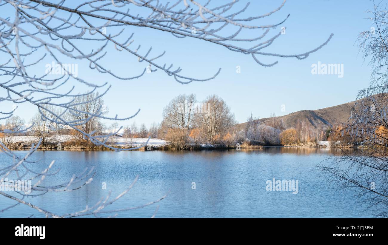Blue sky and icy pond hi-res stock photography and images - Alamy