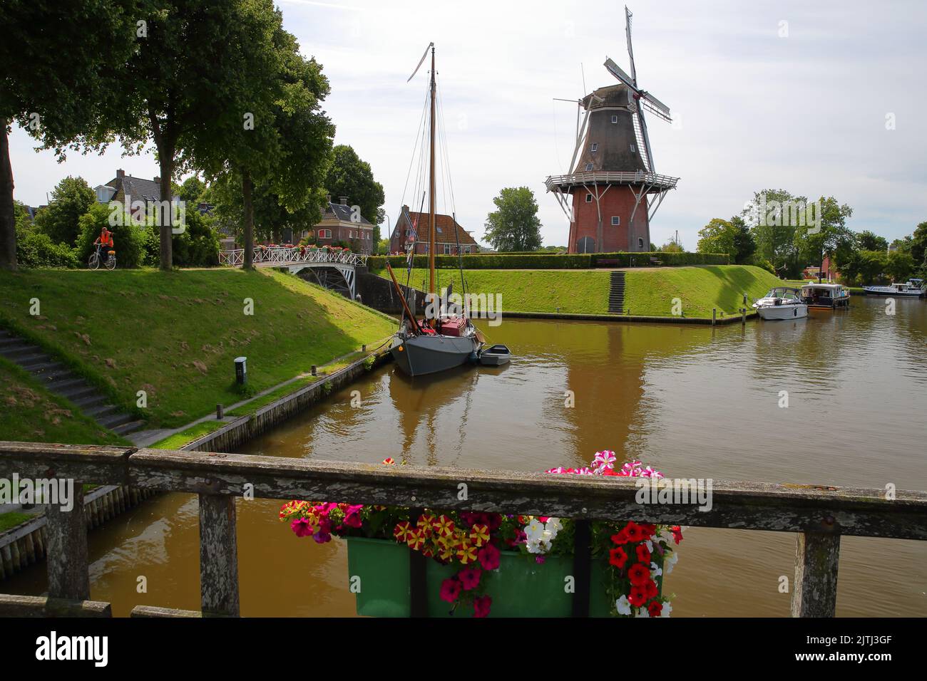 The fortifications viewed from a footbridge in Dokkum, Friesland ...