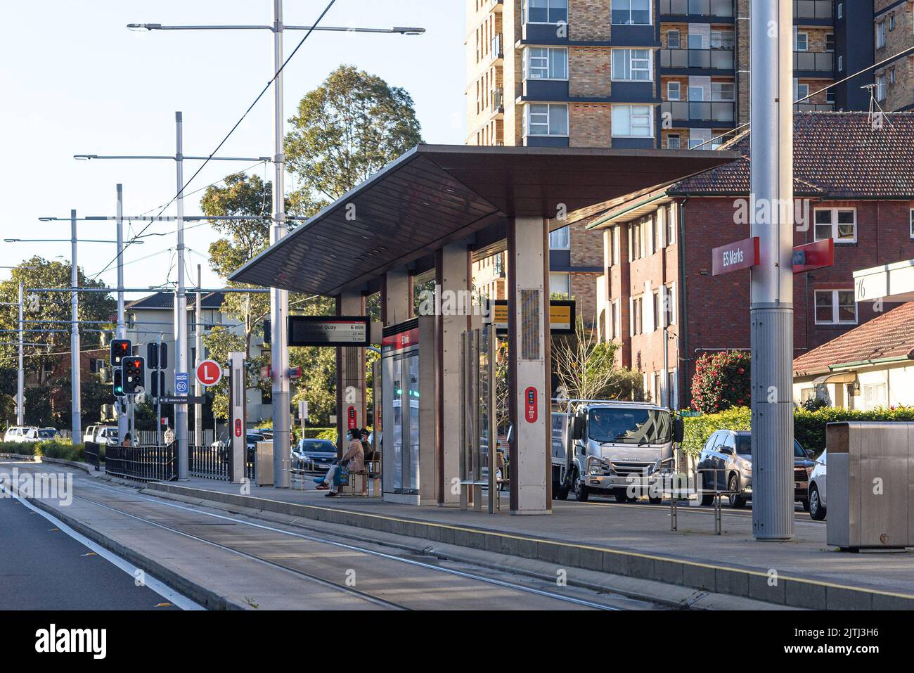 People waiting on the platform at the ES Marks tram stop on Sydney ...
