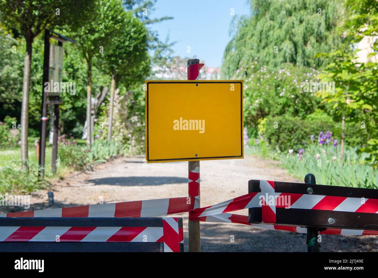 Red and white striped tape, danger and limited access warning. Empty ...