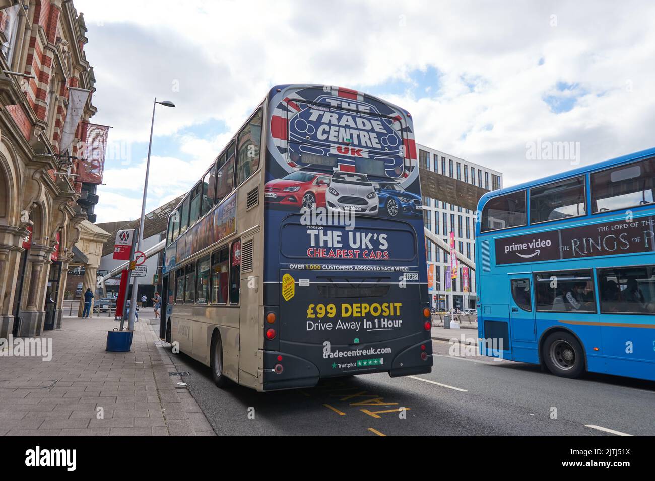 Modern bus on a street in Coventry, UK Stock Photo - Alamy