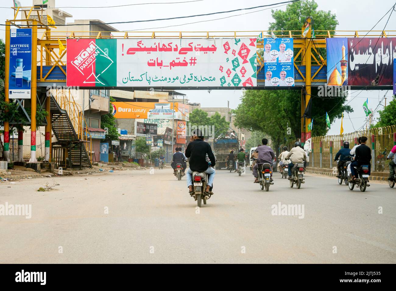 Karachi Korangi Roads and Public Transport and Bikes Stock Photo - Alamy