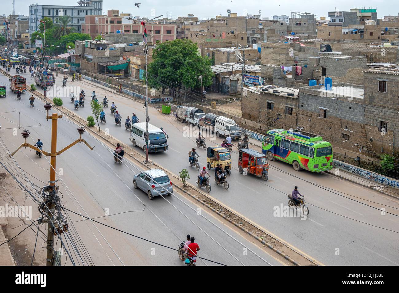 Karachi Korangi Roads and Public Transport and Bikes Stock Photo - Alamy