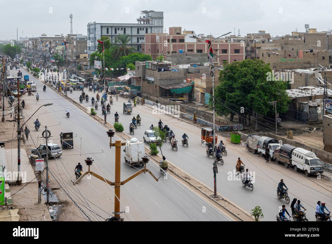 Karachi Korangi Roads and Public Transport and Bikes Stock Photo - Alamy