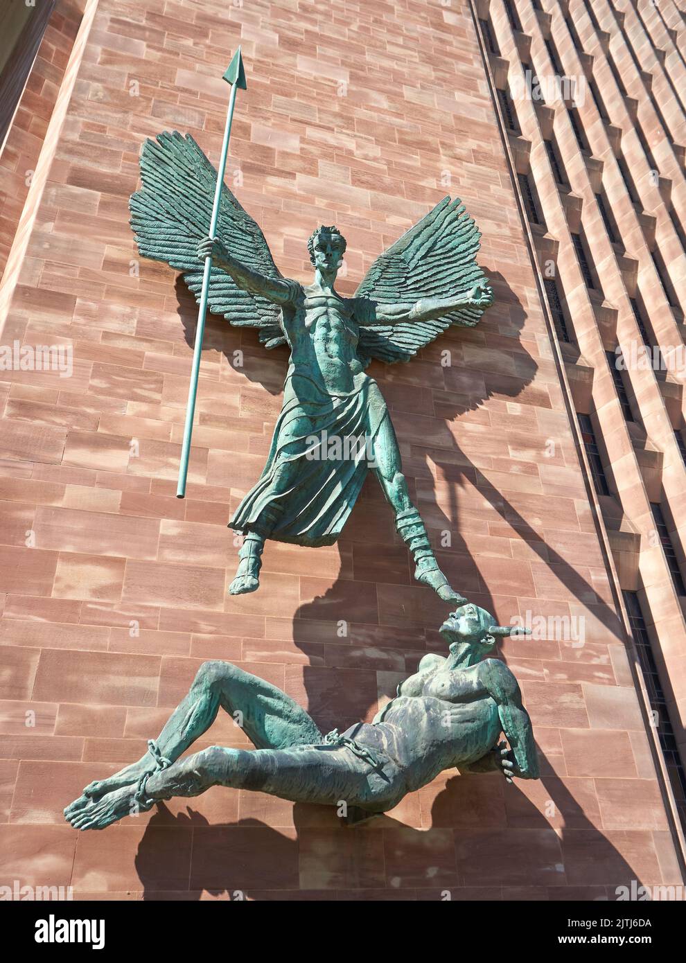 Modern contemporary statue of St Michael on Coventry cathedral Stock ...