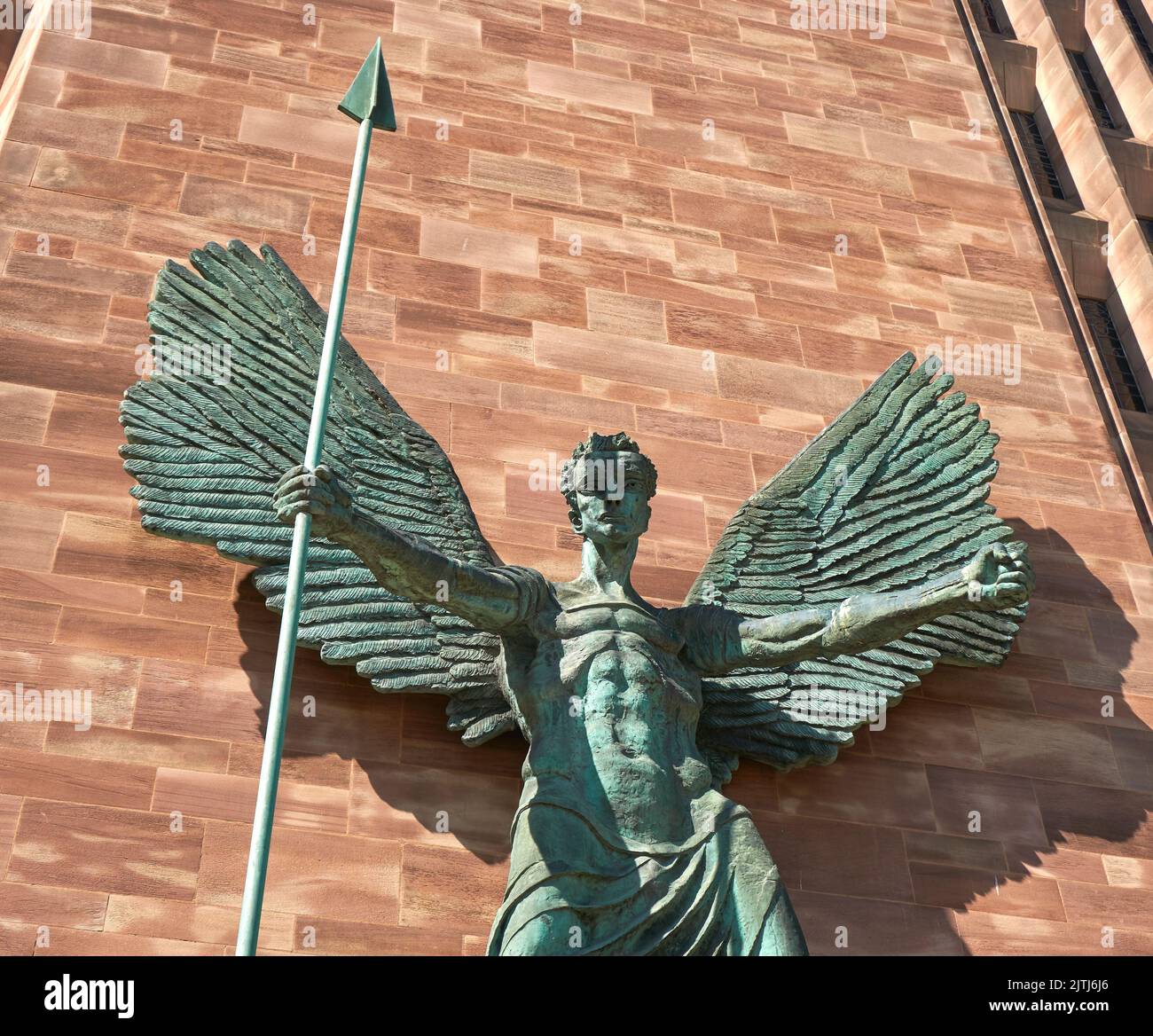 Modern contemporary statue of St Michael on Coventry cathedral Stock ...