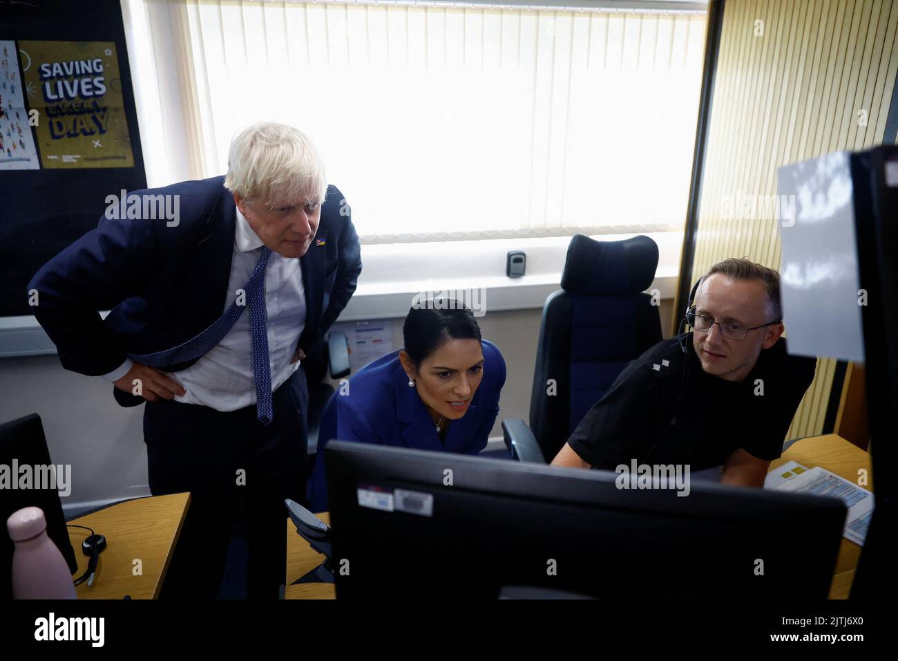British Prime Minister Boris Johnson and Home Secretary Priti Patel are ...
