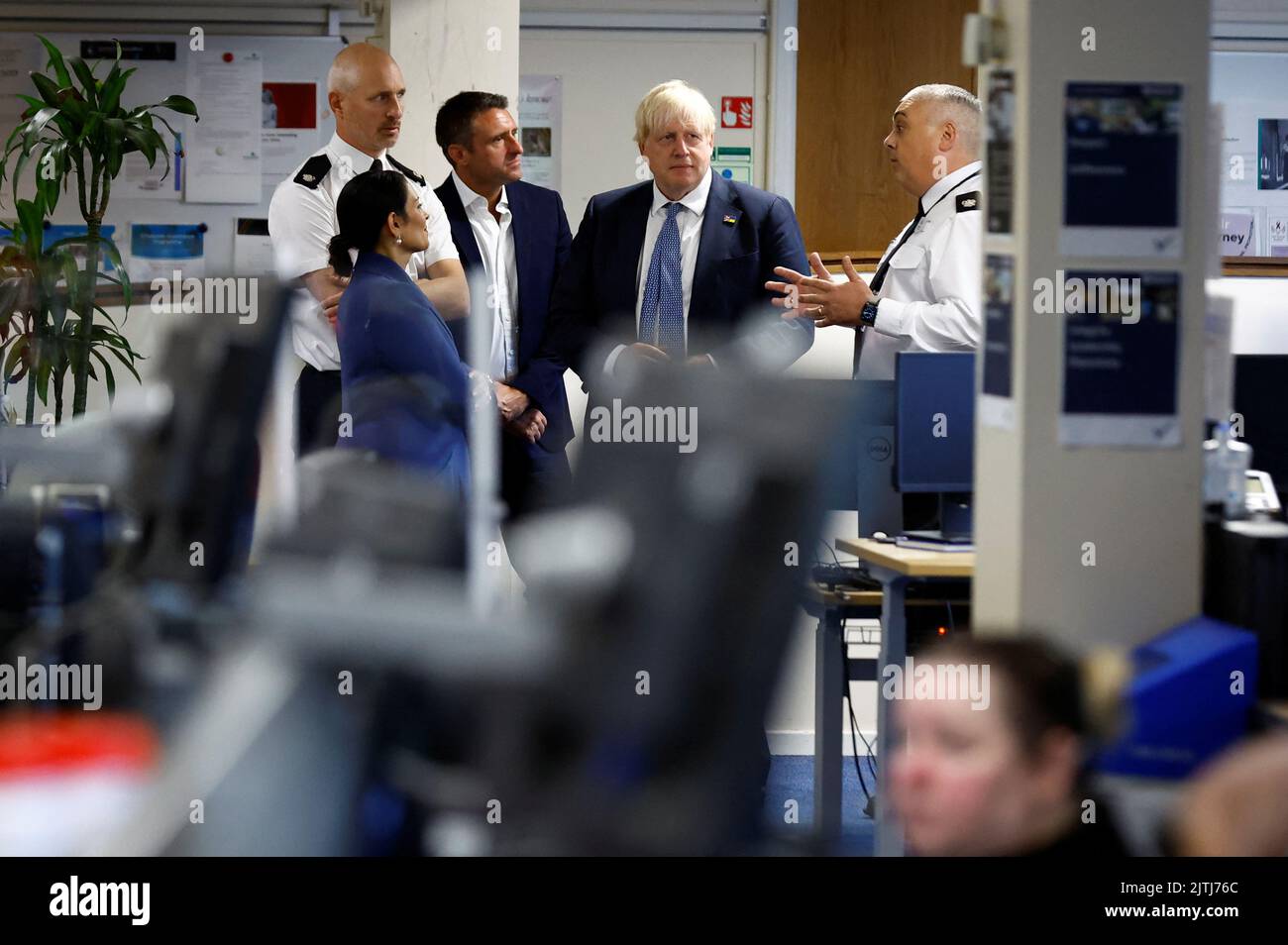 Prime Minister Boris Johnson (second right) and Home Secretary Priti ...