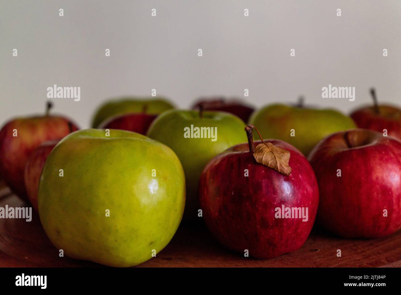 portraits of apples. concept of stacked fruits Stock Photo - Alamy