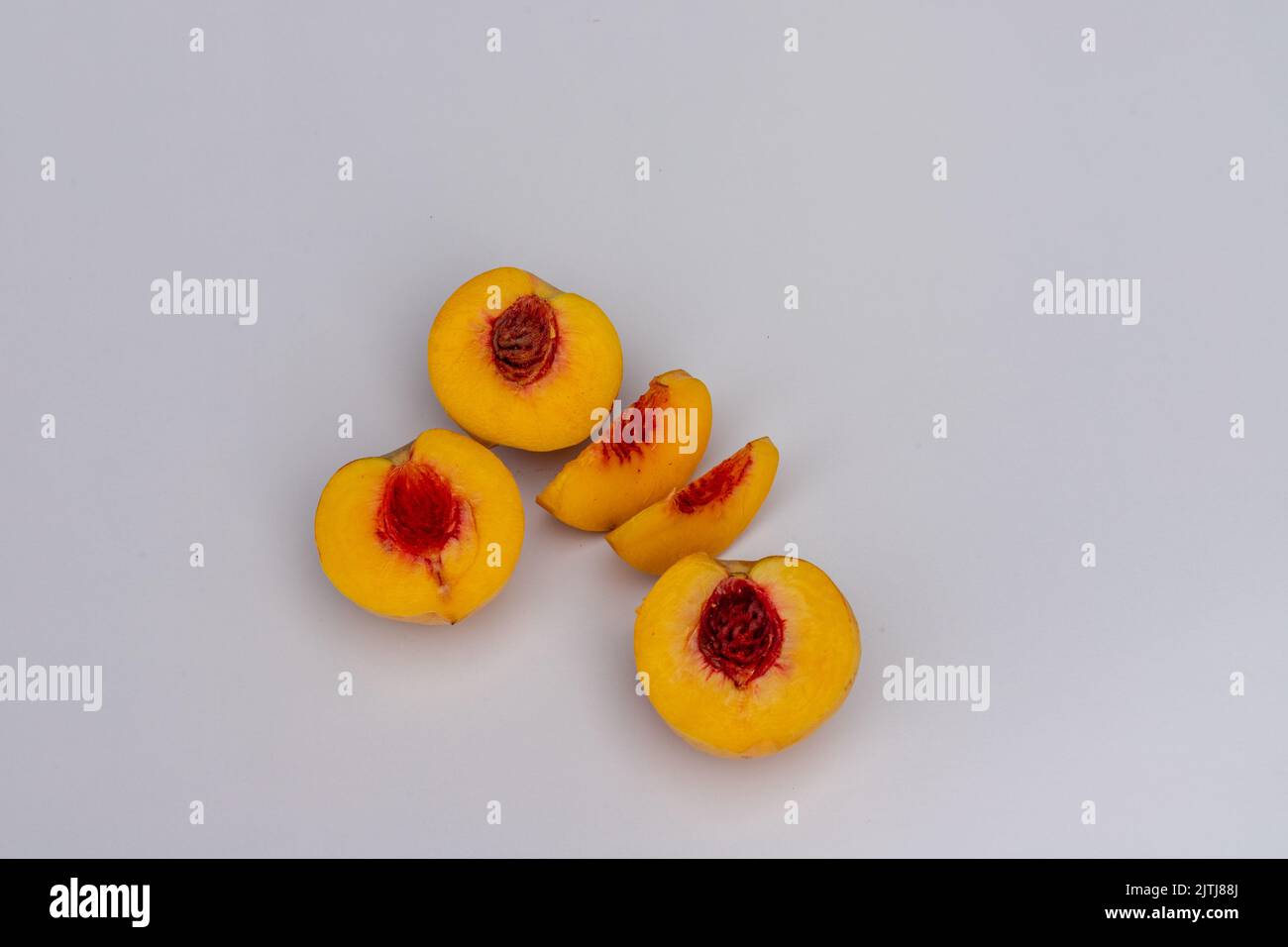 Peach cut in half cutout hi-res stock photography and images - Alamy