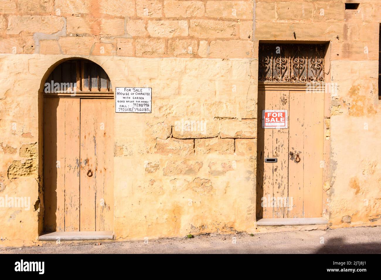 Signs on a traditional house advertising it for sale in Gozo, Malta ...