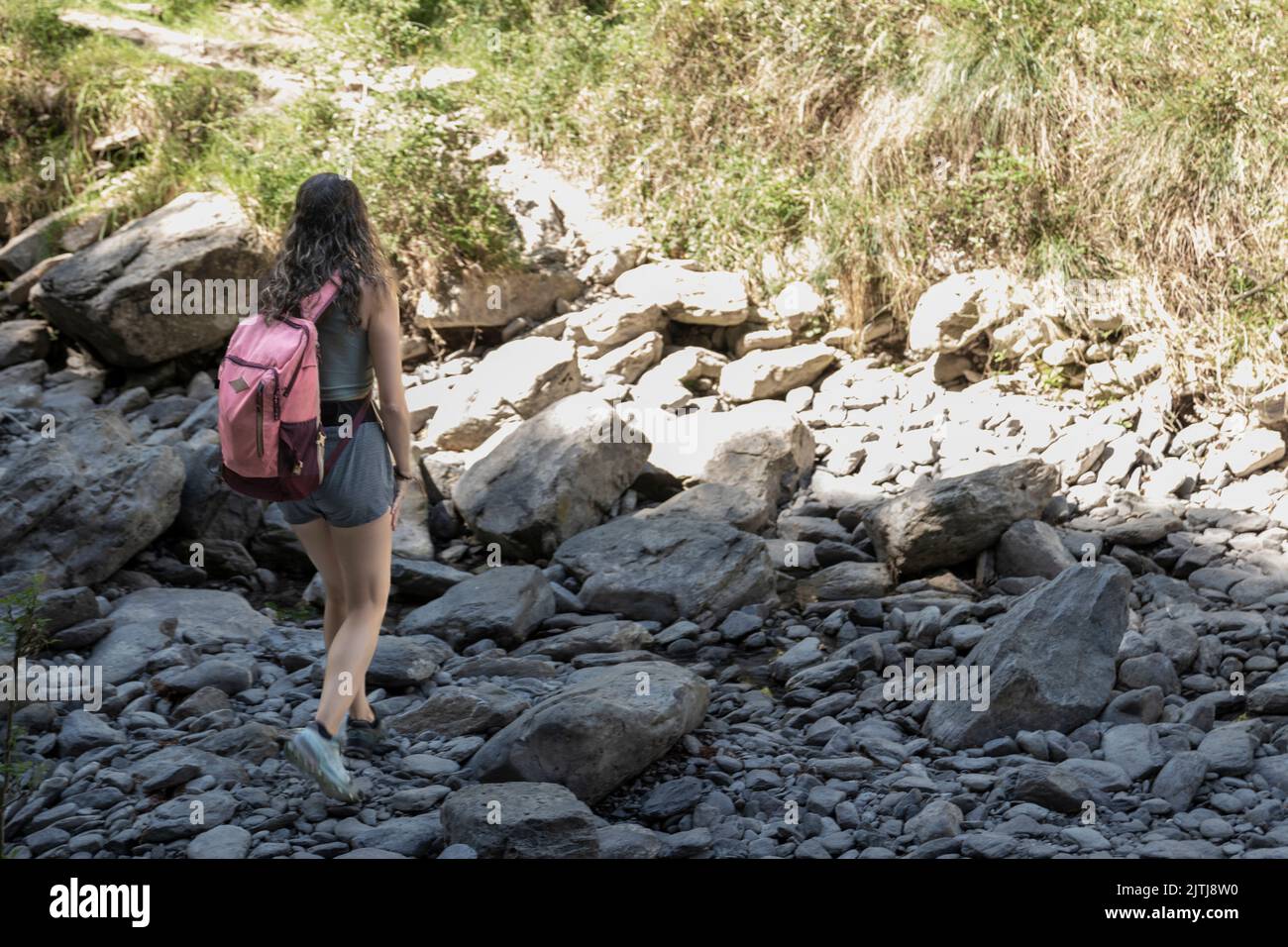 Girl trekking in rocky terrain hi-res stock photography and images - Alamy