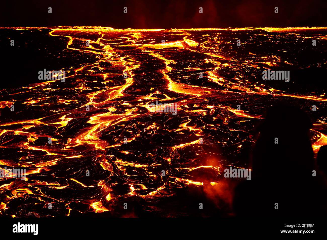 The glowing lava at night. Fagradalsfjall volcano, Iceland Stock Photo ...