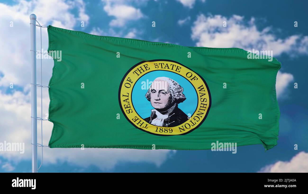 Washington state flag on a flagpole waving in the wind, blue sky ...
