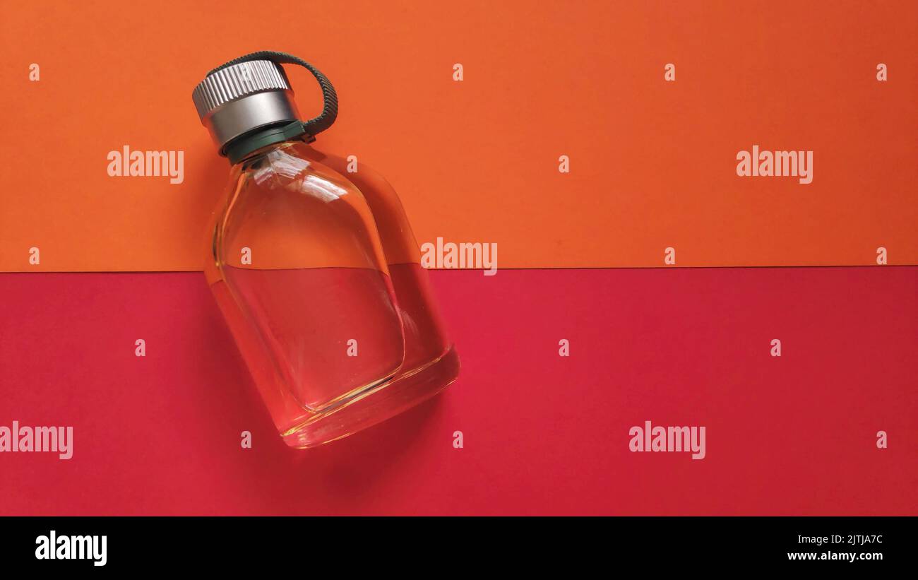 A perfume cologne on a colorful background Stock Photo - Alamy