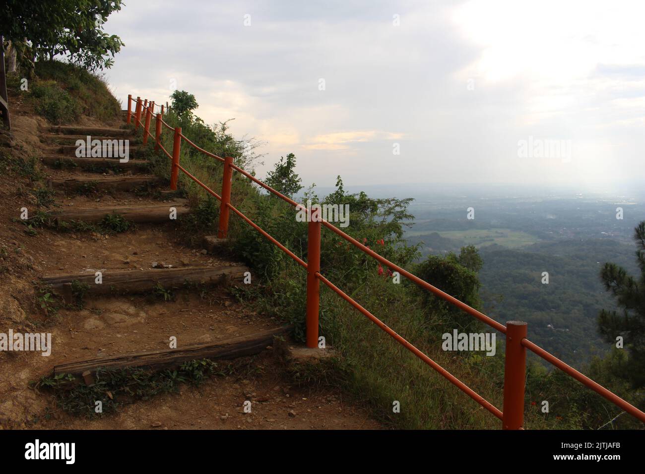 Portrait of a staircase that rises to the top of a hill in the Puncak ...