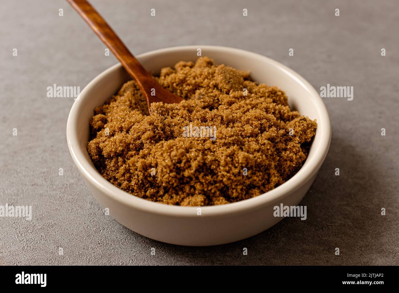 Dark brown sugar made from sugarcane Stock Photo - Alamy
