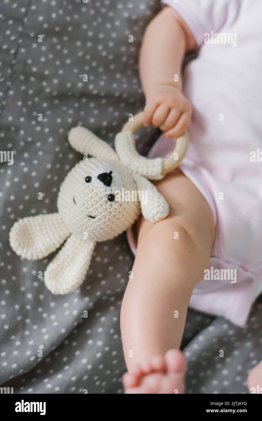 Infant hand toy hi-res stock photography and images - Alamy