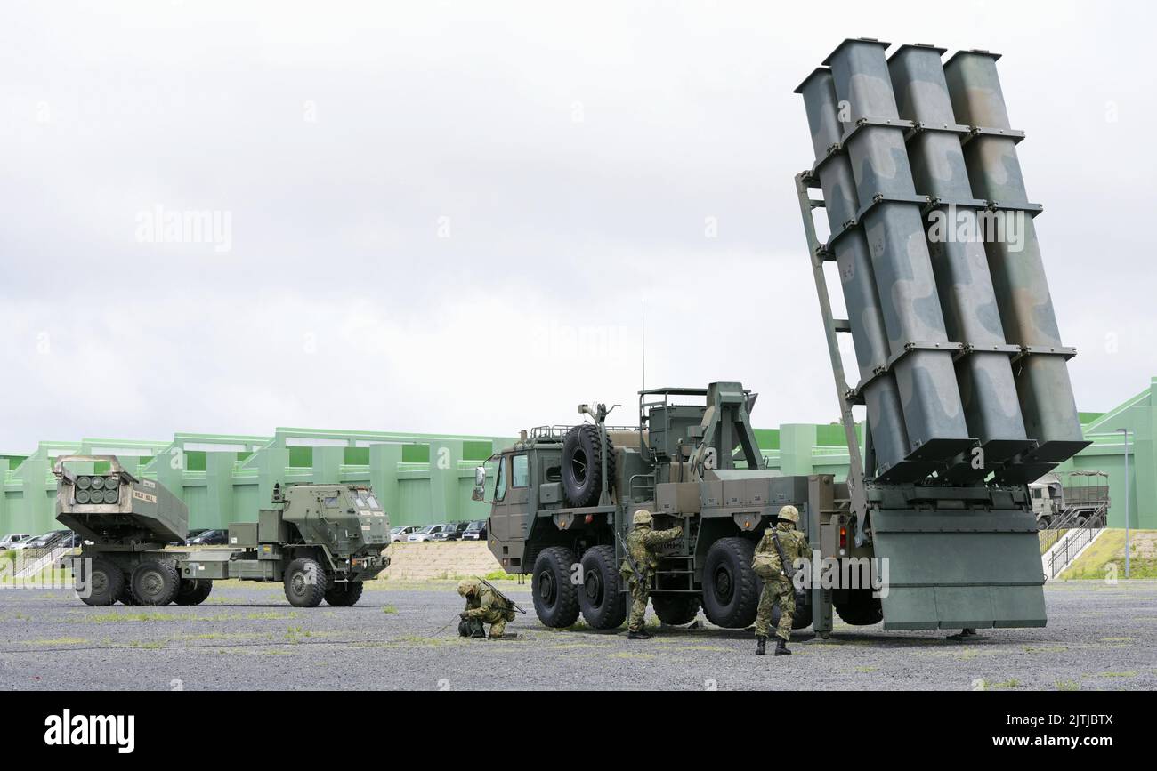 The U.S. HIMARS multiple rocket launcher system (R) is pictured during ...