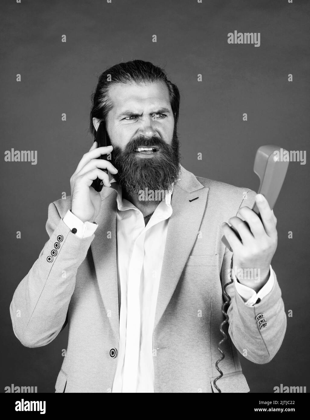 bearded hipster use retro telephone. communication concept. brutal ...
