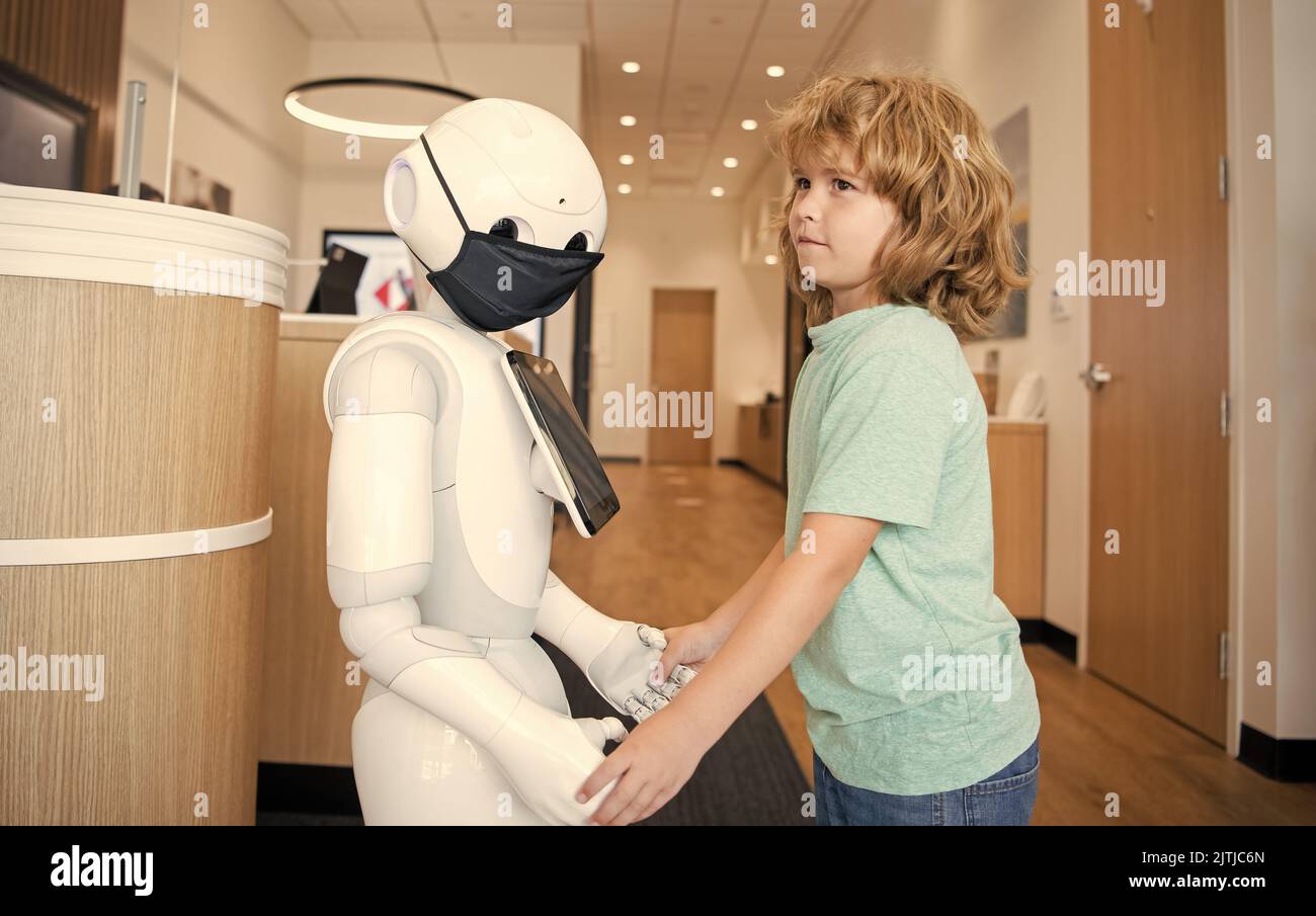 boy interact with robot as innovative technology, communication Stock ...