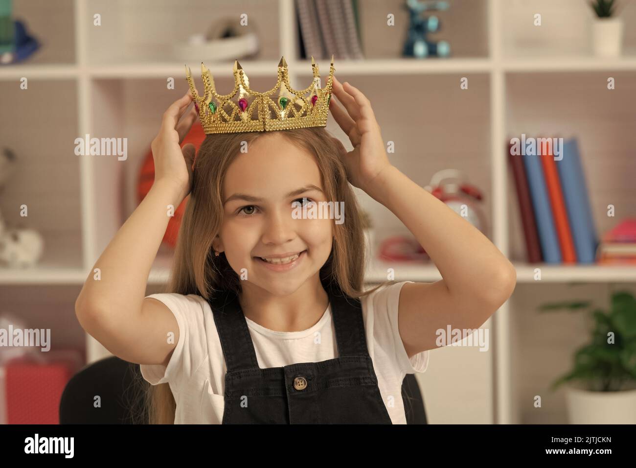 happy child wear queen crown at school classroom Stock Photo - Alamy