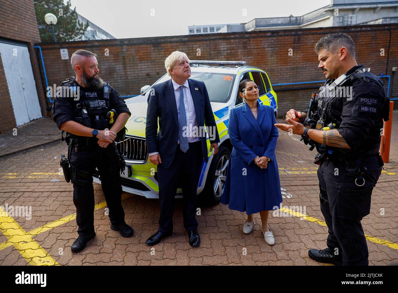 Prime Minister Boris Johnson and Home Secretary Priti Patel are shown ...