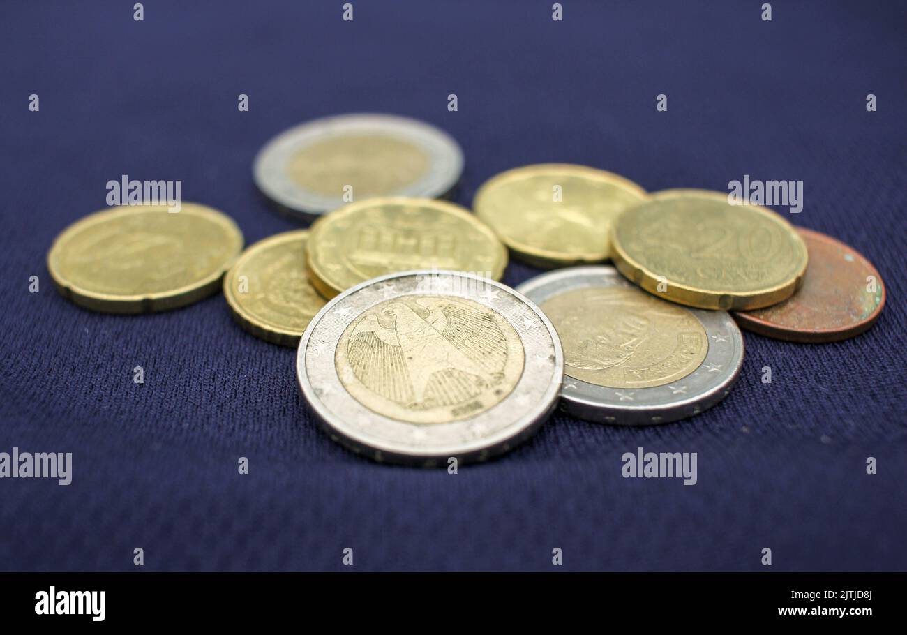 euro coins to pay for purchases in the supermarket Stock Photo - Alamy