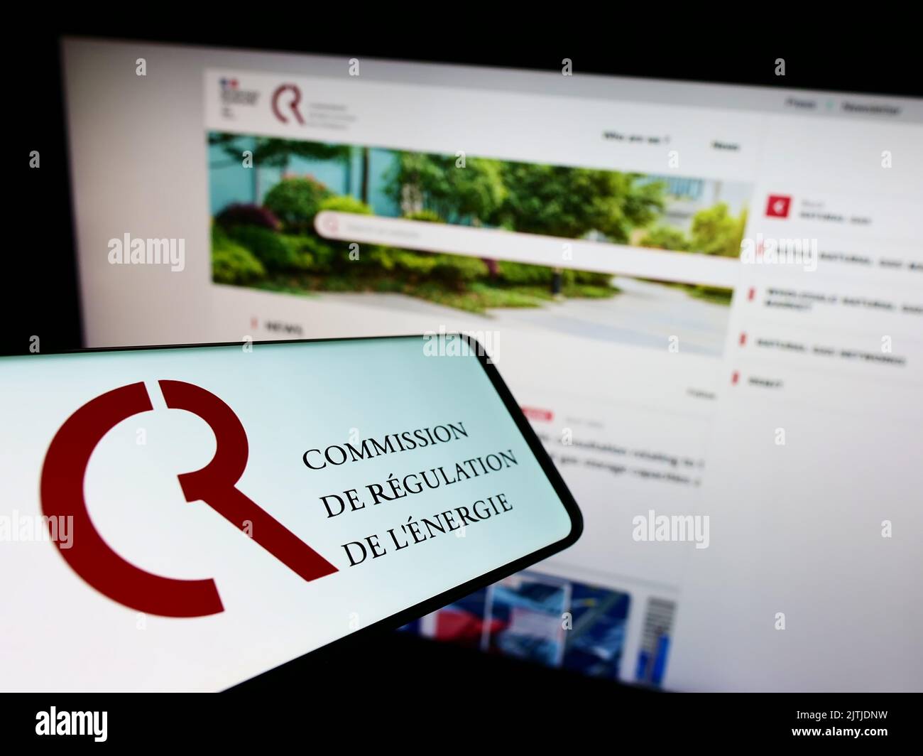 Smartphone with logo of French Commission de Regulation de l'Energie ...