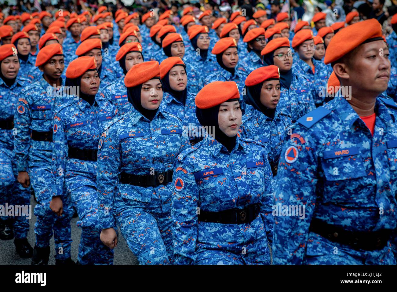 A group of Uniformed Security Forces march in front of the crowd during ...