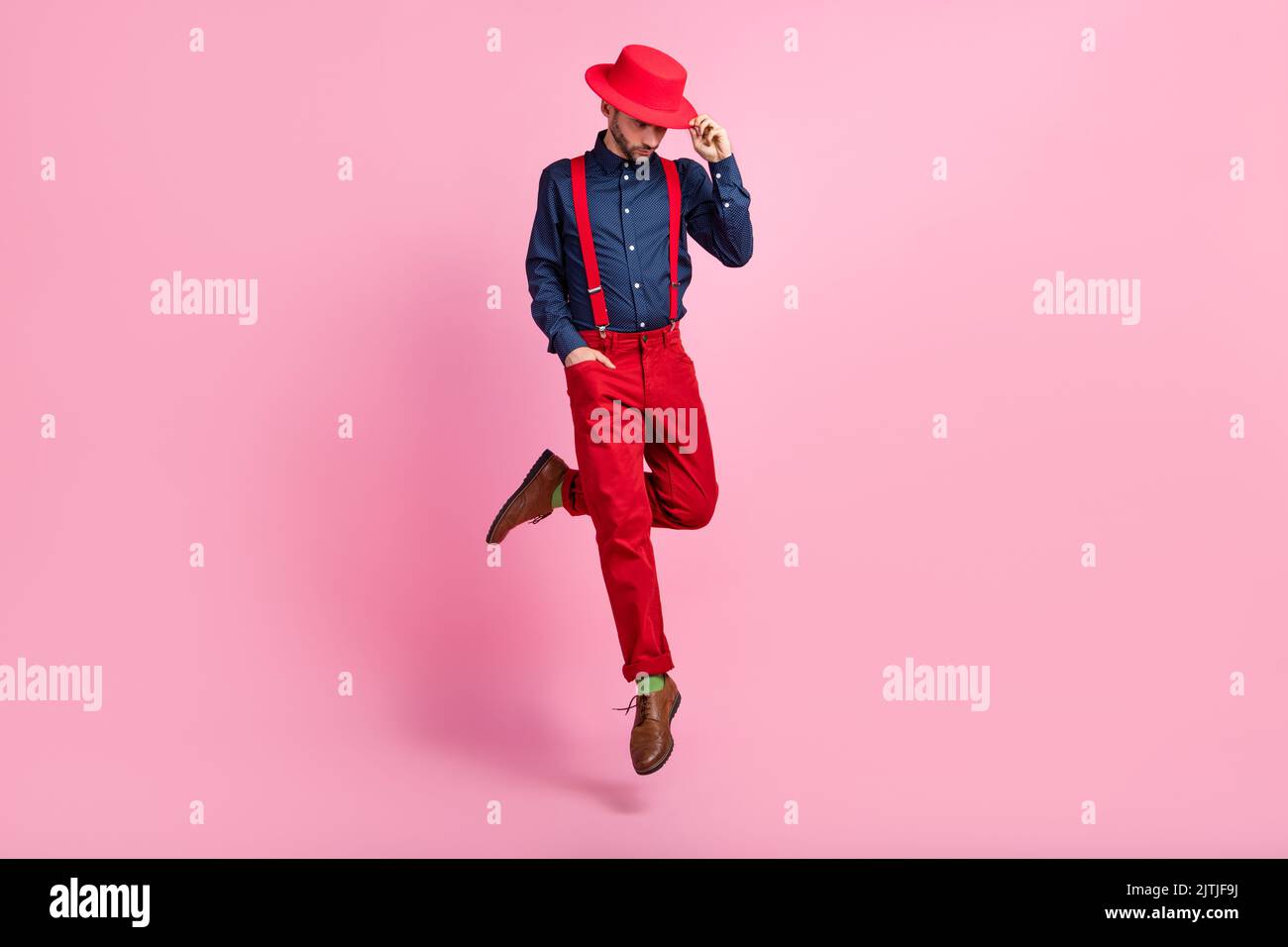 Full size photo young bearded mysterious mister man hold his red hat ...